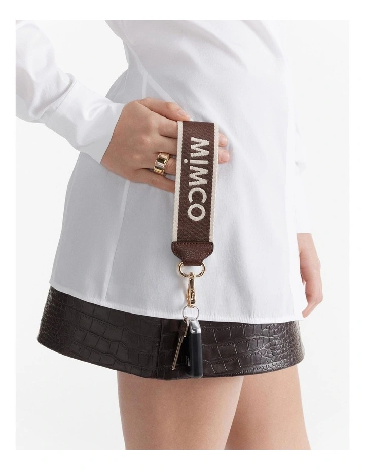 Mimco Stripe Webbing Wrist Strap in Choc Berry | MYER